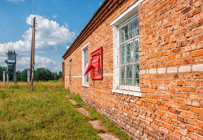 Brick Wall with a Fire Shield Stock Image - Image of power, bucket ...