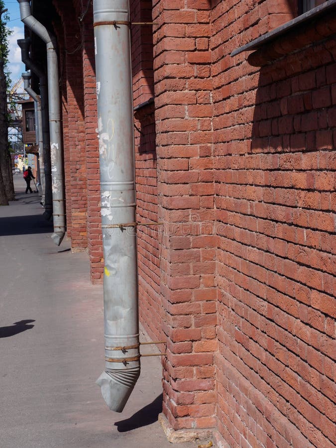 Brick wall with a gutter stock image. Image of estate - 120686161