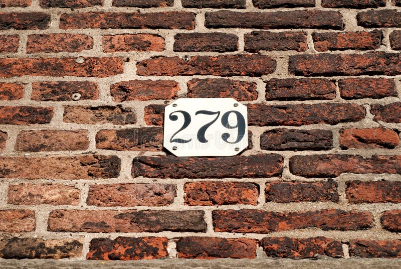 Brick Wall with House Number Stock Photo - Image of house, seventy ...
