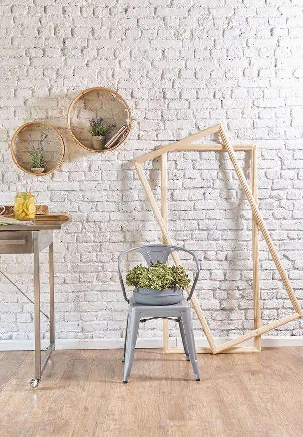 Brick Wall Interior with Round Frame and Table Stock Photo - Image of ...