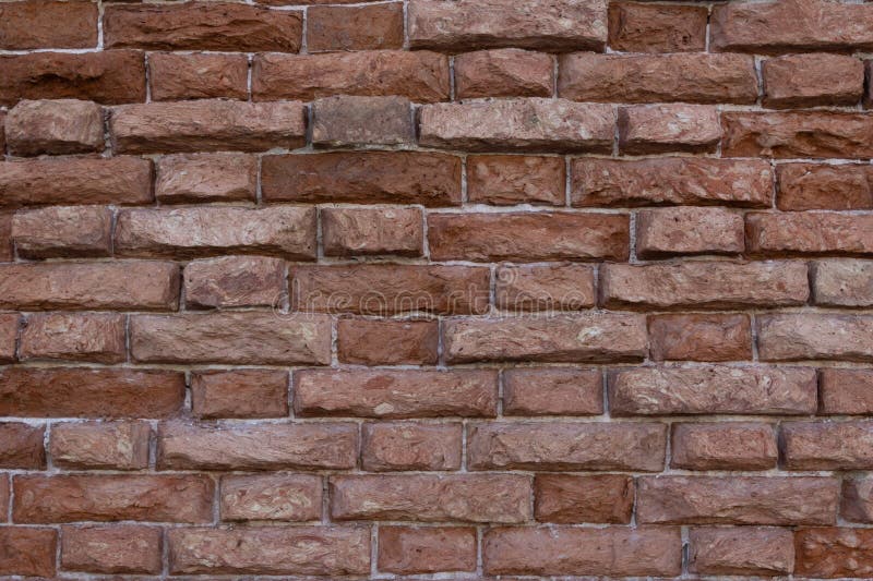 Brick Wall with Jagged Bricks Stock Photo - Image of stone, brickwork ...