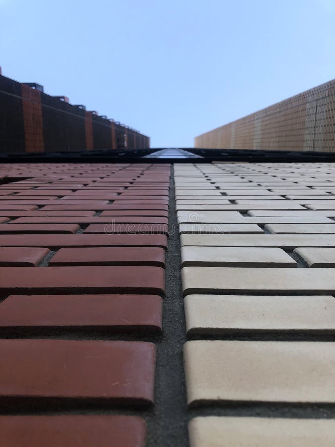 The Brick Wall of a Large Multi-storey Building on the Facade is a ...