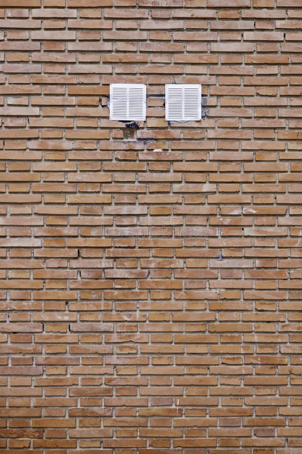 Brick wall with louvers stock photo. Image of construction - 28224436