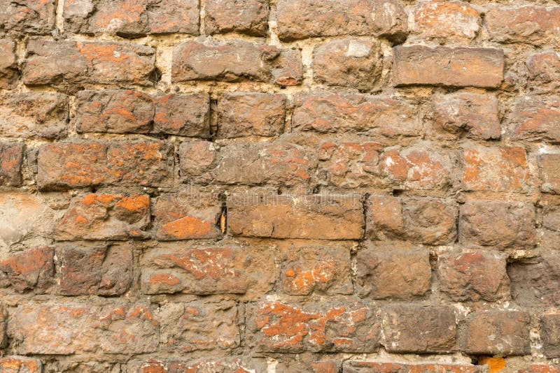 Brick Wall Made of Red Stone Stock Photo - Image of feature, dirty ...