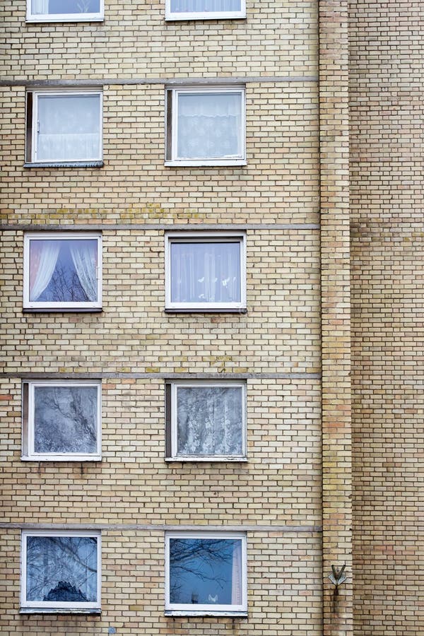 Brick Wall with Many Windows Stock Image - Image of living, dirty: 31184511