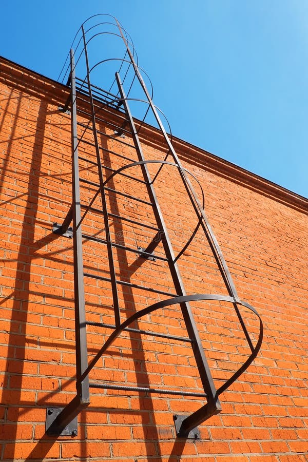 Brick Wall with Metal Ladder Stock Photo - Image of brown, production ...