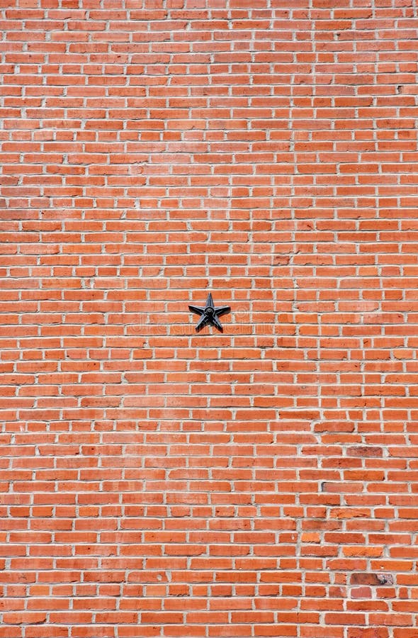 Brick Wall with Metal Star stock photo. Image of wall - 6892156