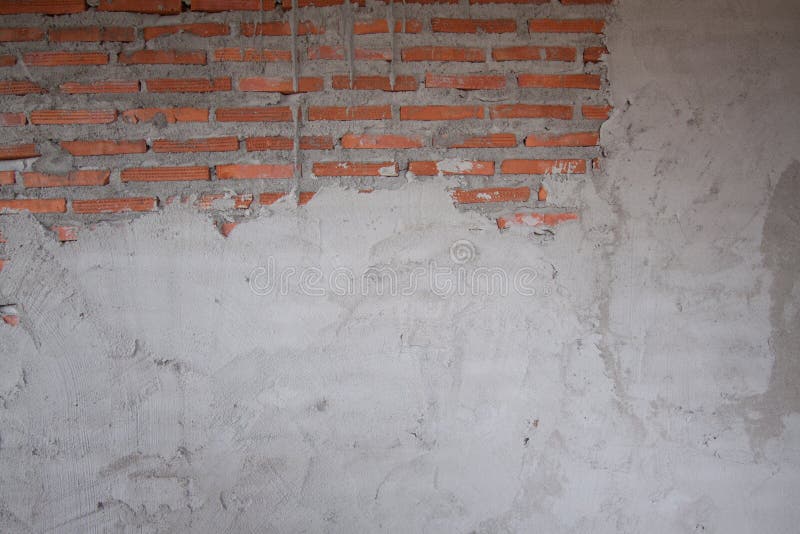 A Brick Wall Mixed with Plaster Unfinished Stock Photo - Image of ...