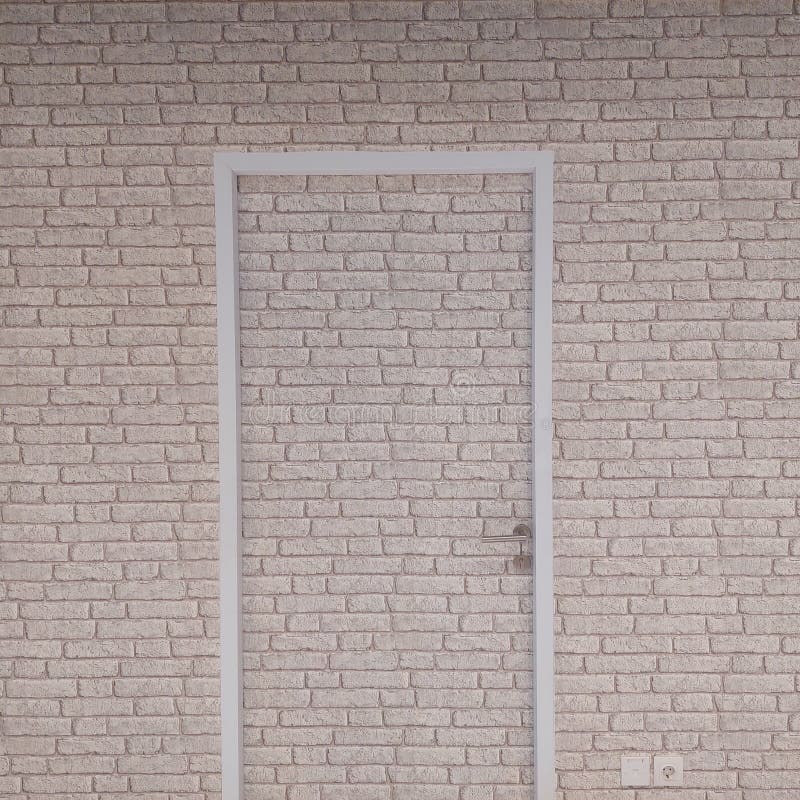 Brick Wall Motif with a Unique Door Design Stock Image - Image of tile ...