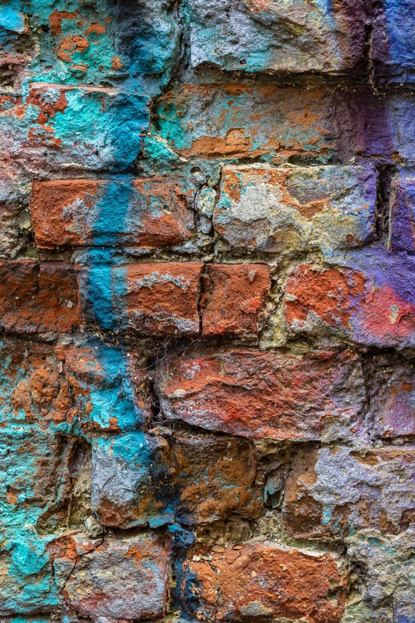 Brick Wall with Multi-colored Paint Close-up. Background Brick Creative ...