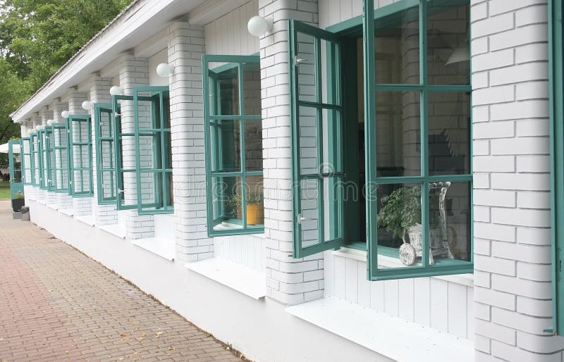 Brick Wall with Open Windows Stock Photo - Image of structure, room ...