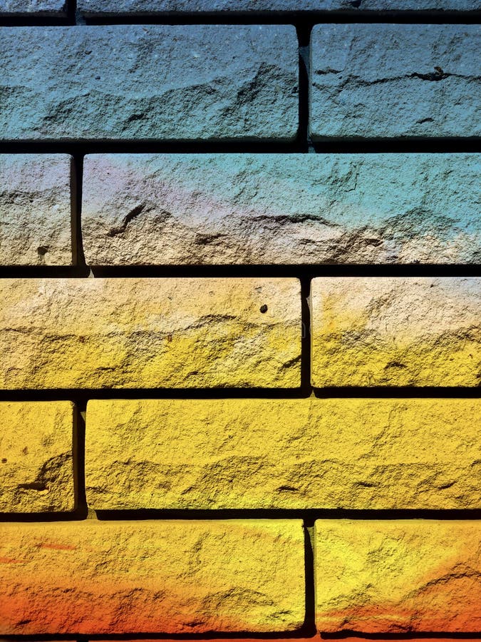 Brick Wall Painted in Bright Colors Stock Image - Image of yellow ...