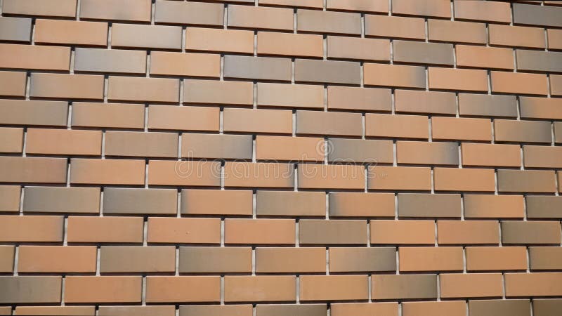 Brick Wall in Patinated Brown Tones. Brick Wall Made of Expensive ...