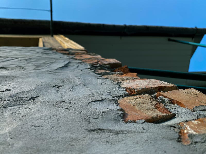 Brick Wall in Plaster, Construction Process, Bottom Up View, Roof and ...