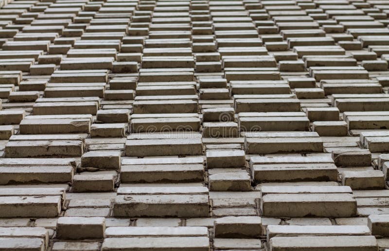Brick Wall with Protruding Bricks Stock Image - Image of close, park ...