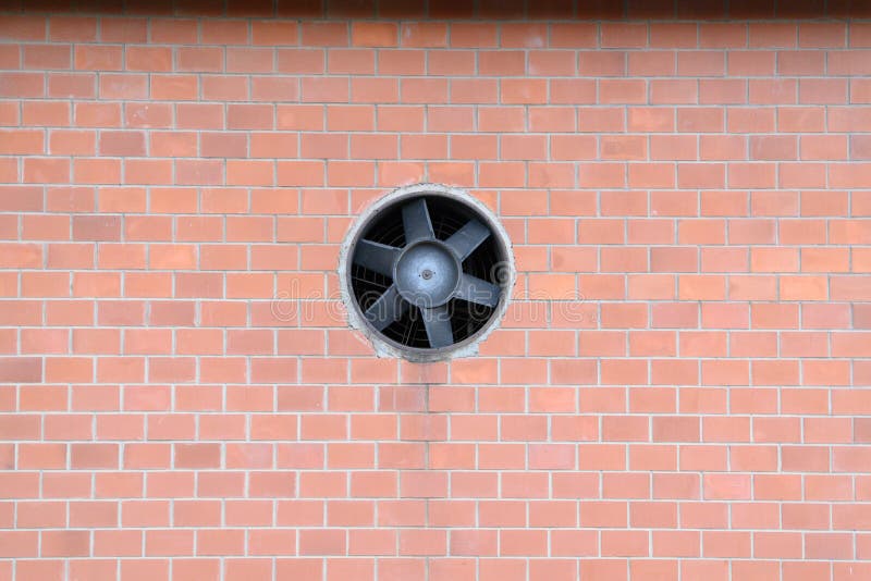 An Industrial Fan in a Brick Wall Stock Image - Image of electrical ...