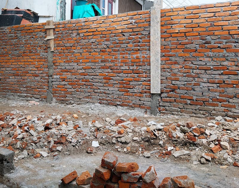 Brick Wall with Rubble in Front of it. Stock Photo - Image of ruins ...