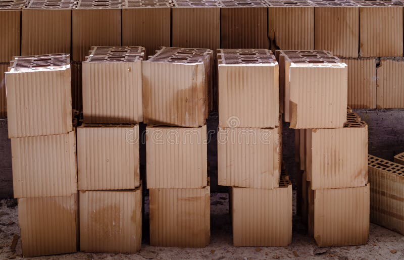 Brick Wall with a Stack of New Bricks Stock Photo - Image of stack ...