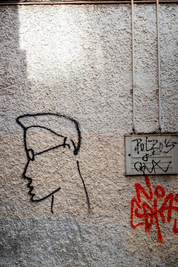 Brick Wall in a Suburb with Poorly Crafted Graffiti Stock Photo - Image ...