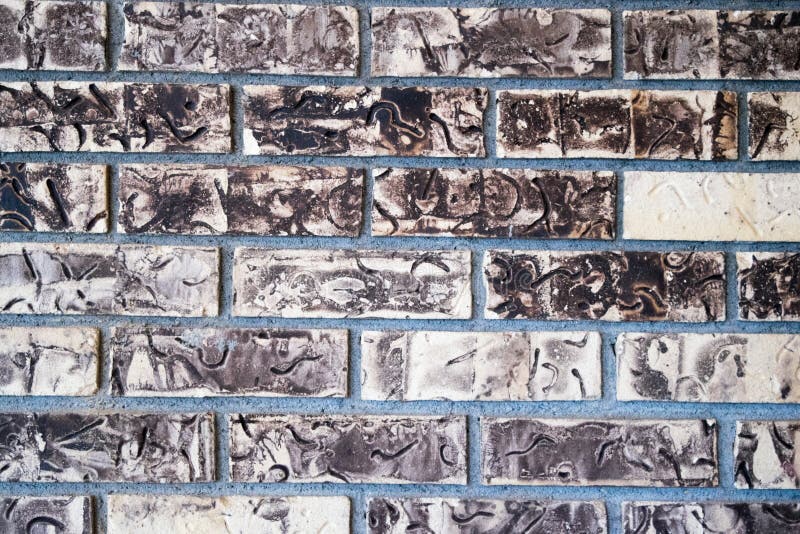 Brick Wall with Swirling Designs in Rectangle Brick Stock Photo - Image ...