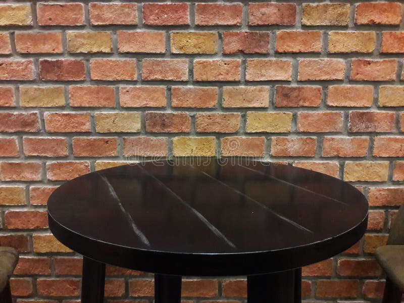 Brick wall and table stock image. Image of wallpaper - 115055231
