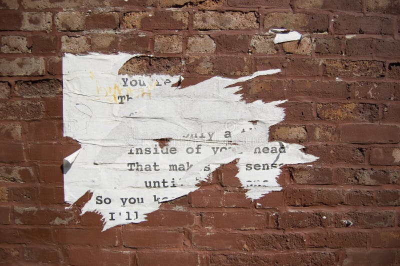 Brick Wall with Torn Paper stock image. Image of wall - 39881431