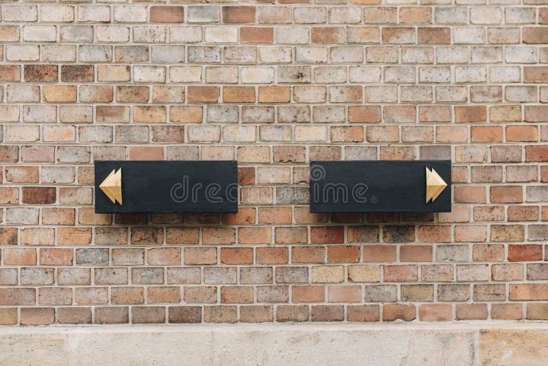 Brick Wall with Two Signboards with Direct Way Stock Image - Image of ...