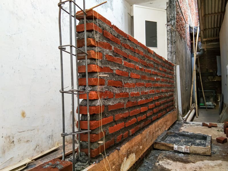 Brick Wall Under Construction Stock Photo - Image of architecture ...
