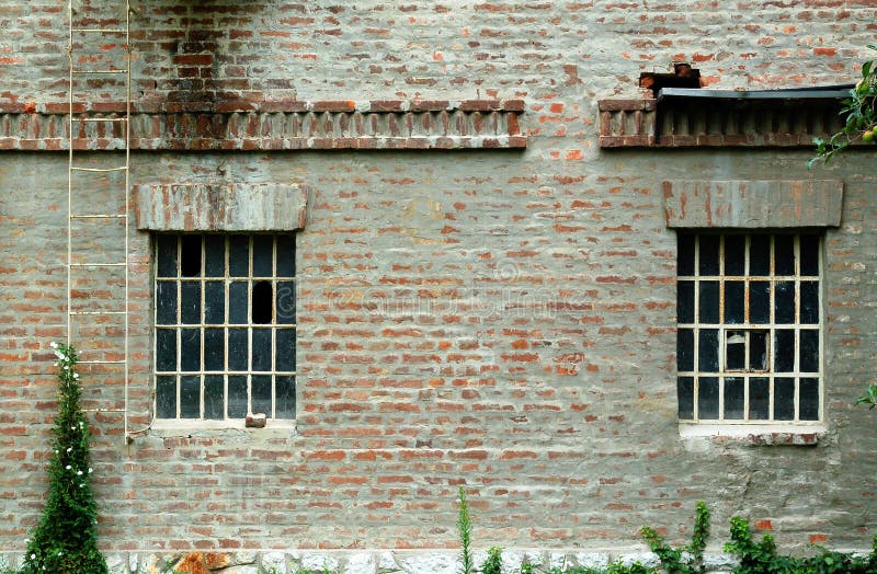 Brick wall with windows stock image. Image of extint - 13493513