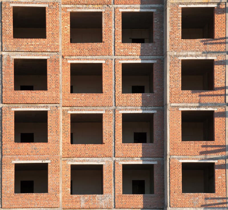 Brick Wall with Windows Under Construction Stock Photo - Image of ...