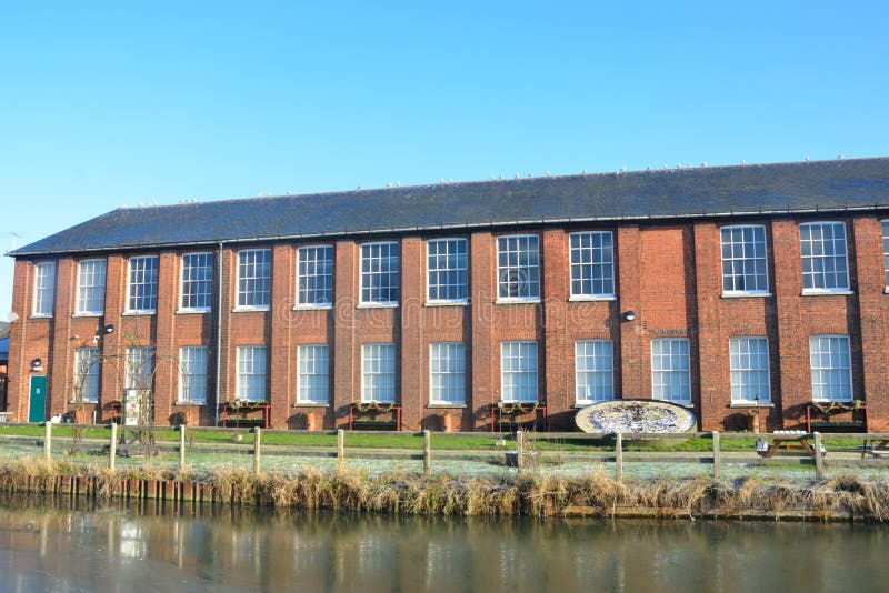 Brick warehouse by river stock image. Image of industry - 28718001