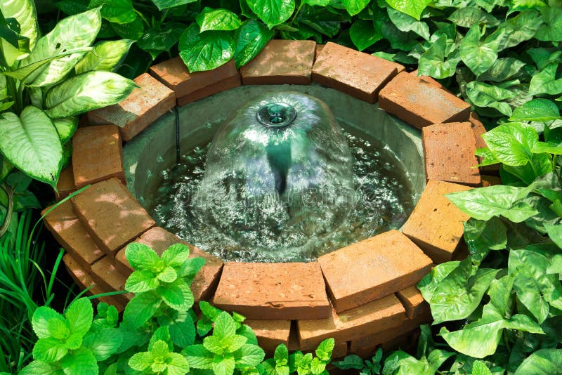 Brick Water Well with Green Creeper Stock Photo - Image of bucket ...