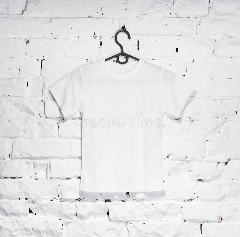 Brick Whitewashed Wall with White T-shirt on Hanger Stock Image - Image ...