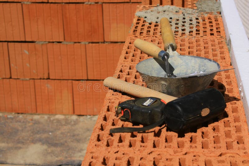 Bricklayer stock image. Image of building, metre, tools - 10464665
