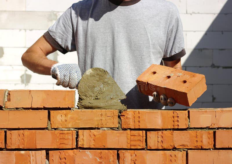 Bricklayer at work stock image. Image of blocks, hard - 9169193