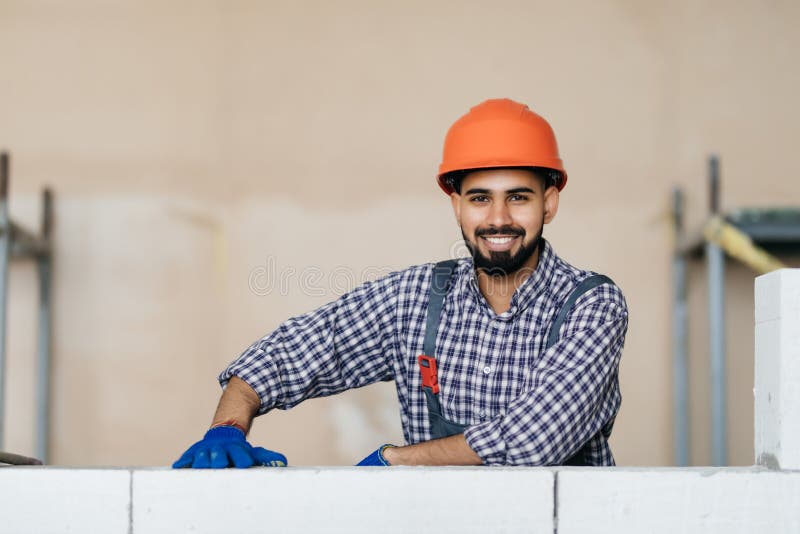 Bricklayer Builder Working with Autoclaved Aerated Concrete Blocks ...