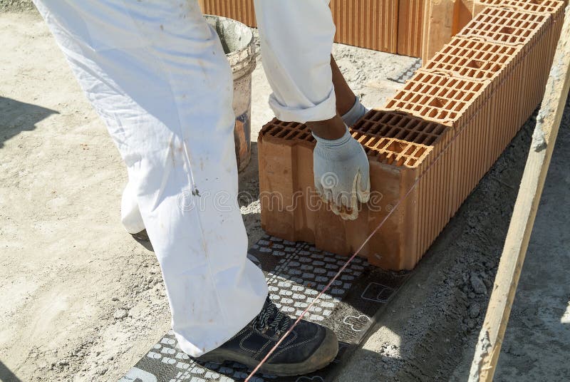 Bricklayer Building a Brick Wall Stock Photo - Image of equipment ...
