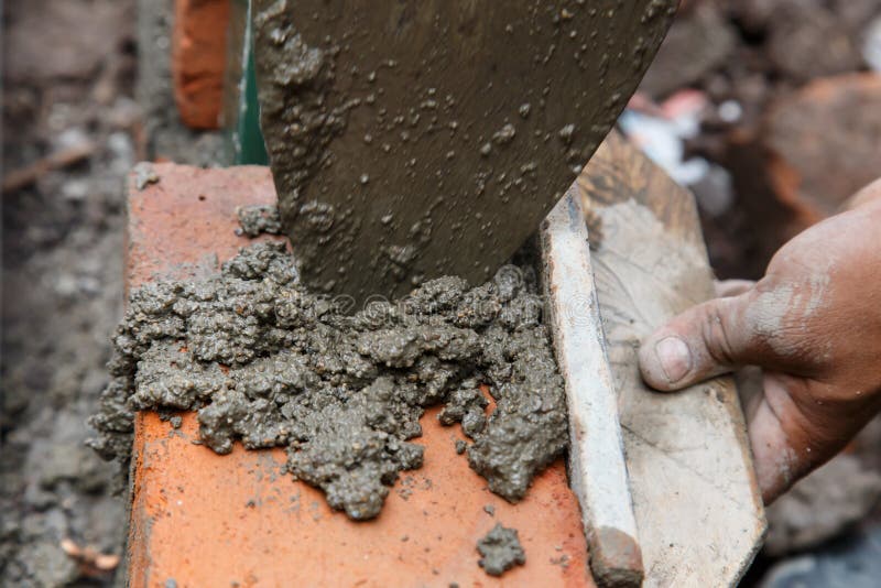 Bricklayer Building a House Using Tools and Cement Stock Photo - Image ...
