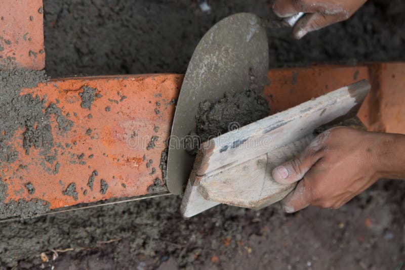 Bricklayer Building a House Using Tools and Cement Stock Photo - Image ...