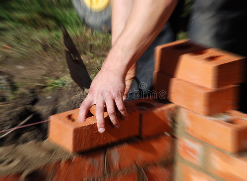 Bricklayer building wall stock photo. Image of closeup - 89064970