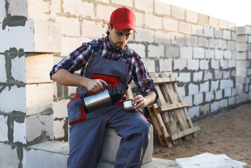 Bricklayer during the Coffee Break at the Work Stock Image - Image of ...