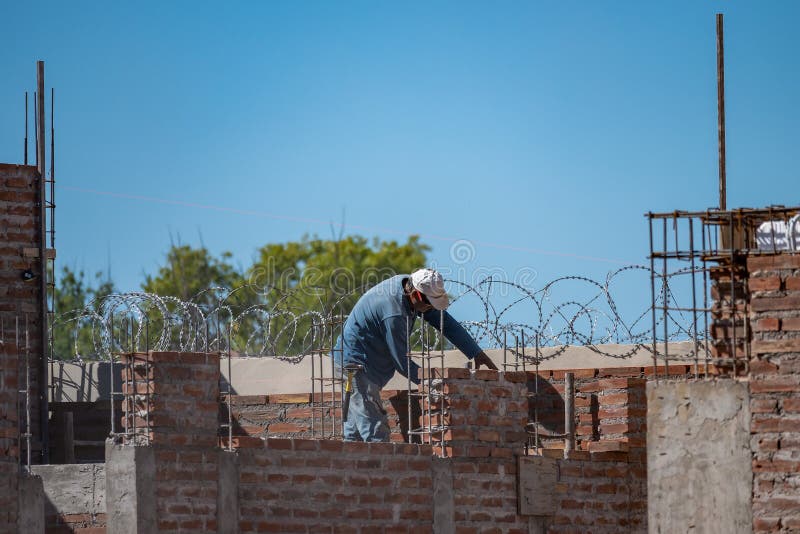 Bricklayer Laying Mud Bricks in House Construction in Argentina Stock ...