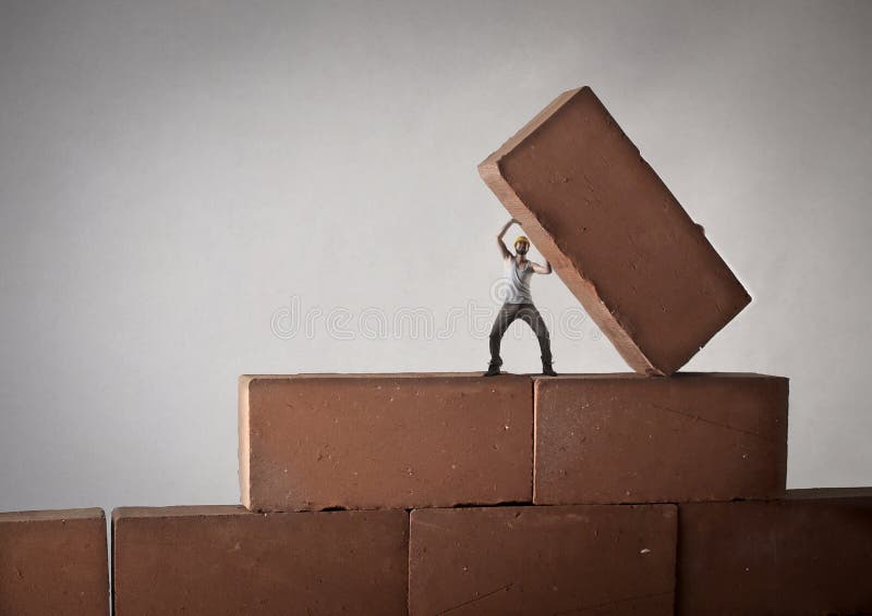 Bricklayer Lifting Up a Brick Stock Photo - Image of house, mason: 38271968