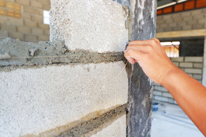 Mason Measuring Cement Brick Wall Stock Image - Image of commercial ...