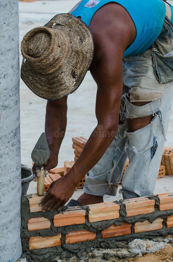 Bricklayer in site stock image. Image of brick, laying - 36686527