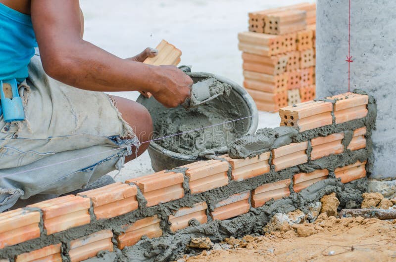 Bricklayer in site stock photo. Image of installing, business - 36686752