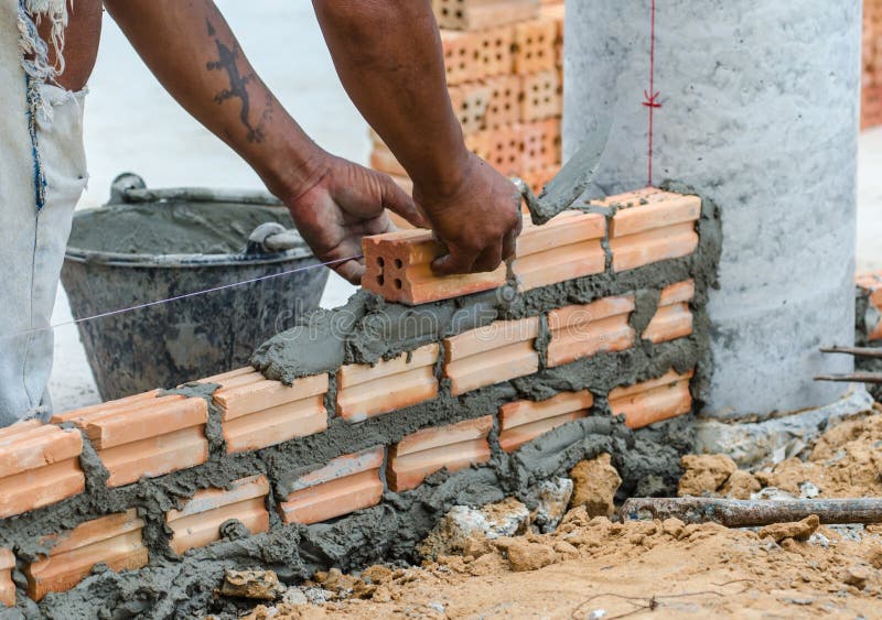 Bricklayer in site stock photo. Image of brown, concrete - 36686832