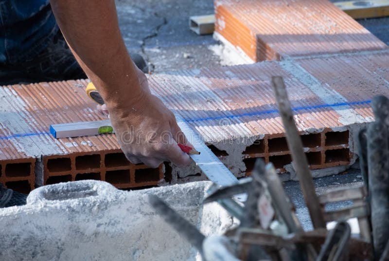 Various Masonry and Brickwork Tools Being Used on a Construction Site ...
