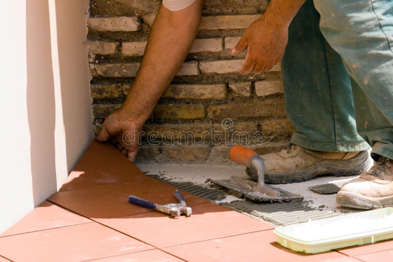Bricklayer at work stock image. Image of adult, laying - 5464257