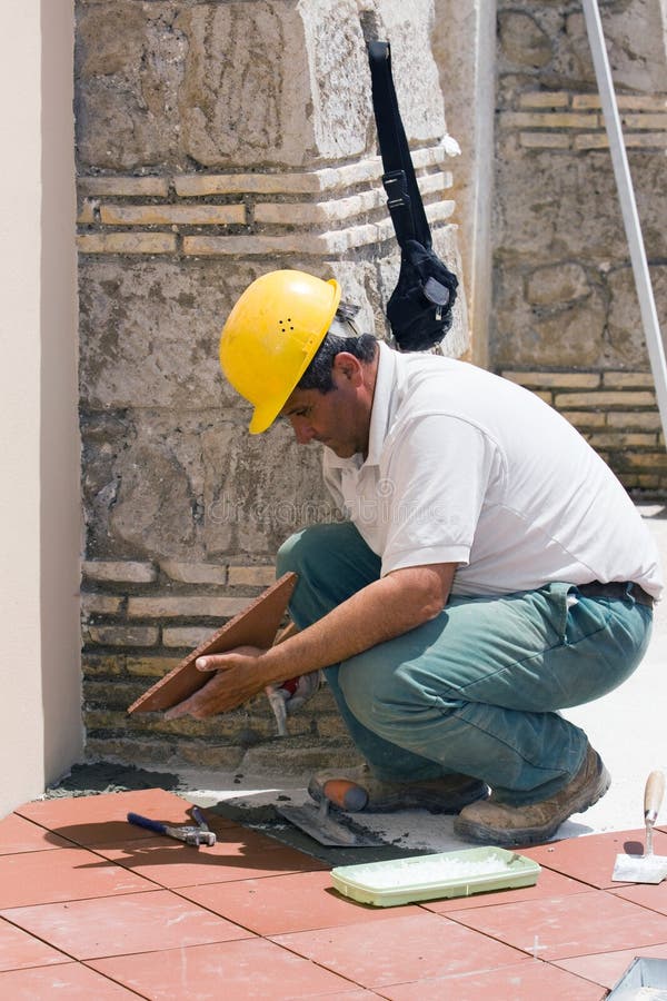 Bricklayer at work stock image. Image of adult, laying - 5464257
